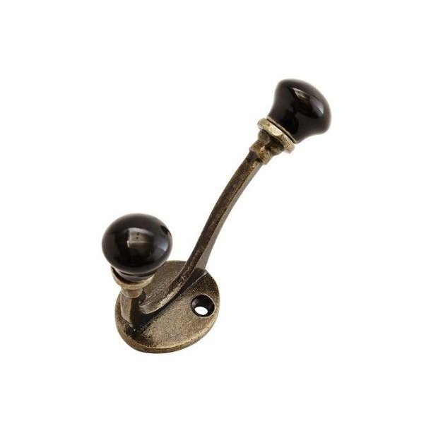 Knagg, sort med messing - Knagger og knaggrekker - Solstrand Interiør